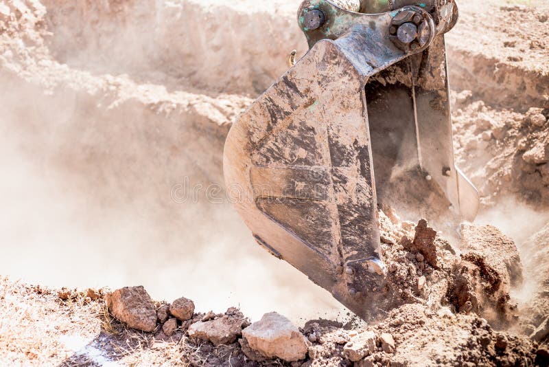 Working Excavator Tractor Digging a Trench. Stock Photo - Image of ...