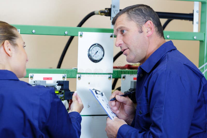 They working in factory stock image. Image of site, progress - 234518083