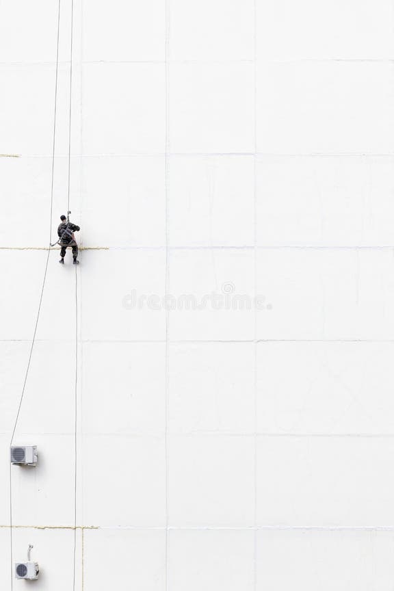 Working Figure Climbing a Wall Stock Photo - Image of city, figure ...