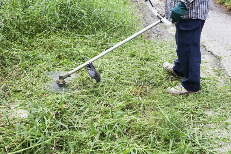 Working in Garden Grass Cutting by Motor Engine Stock Image - Image of ...