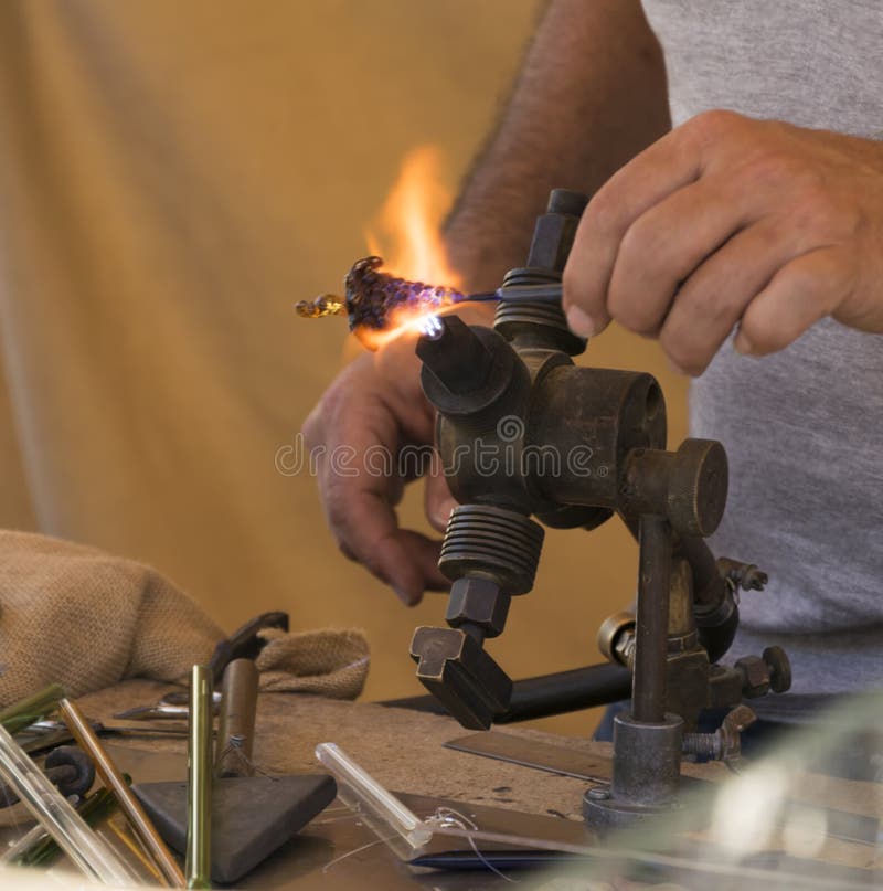 Working the glass. stock photo. Image of show, torch - 92905618