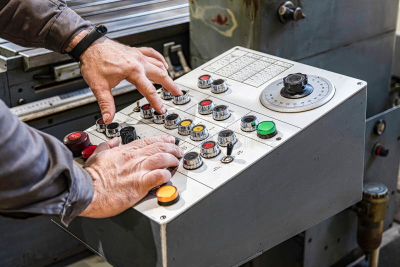 The Working Grinder Switches the Regulators on the Control Panel for ...