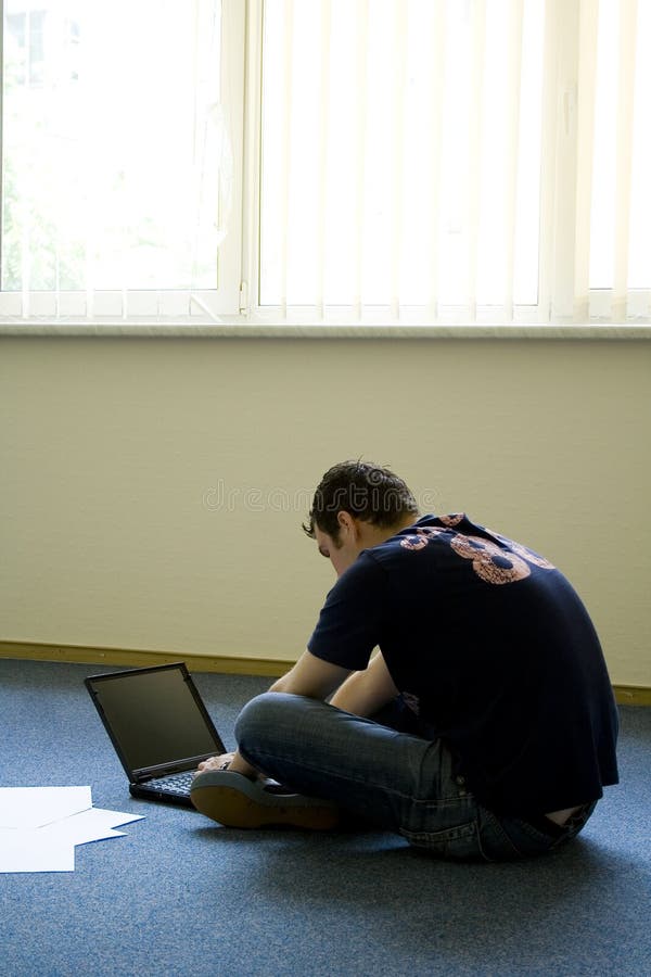 Working on ground stock image. Image of concentration, sheets - 333327