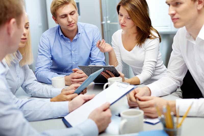 Serious Group of Business People in a Meeting Stock Image - Image of ...