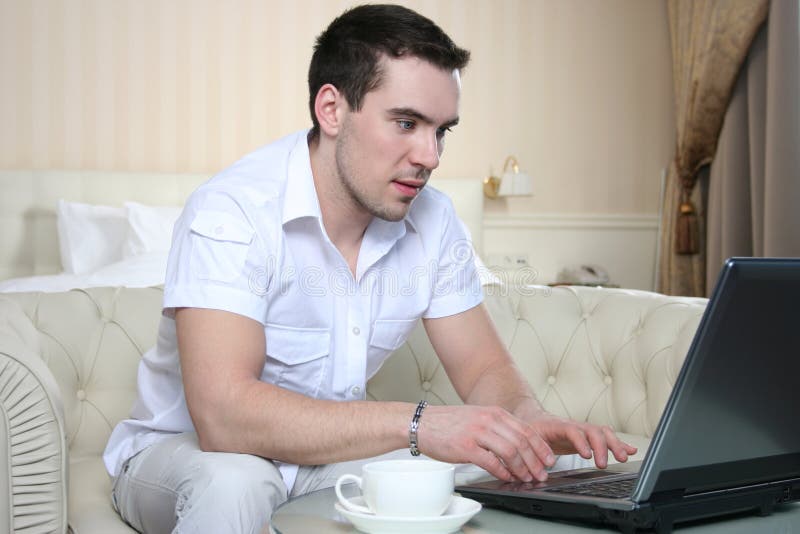 Working guy stock photo. Image of adult, sofa, computer - 9605530