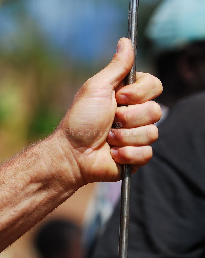 Working Hand Holding Steel Rod Stock Photo - Image of fingers, borehole ...