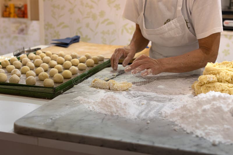 Working with Hands of Uncooked Dough with Flour and Eggs for Making ...