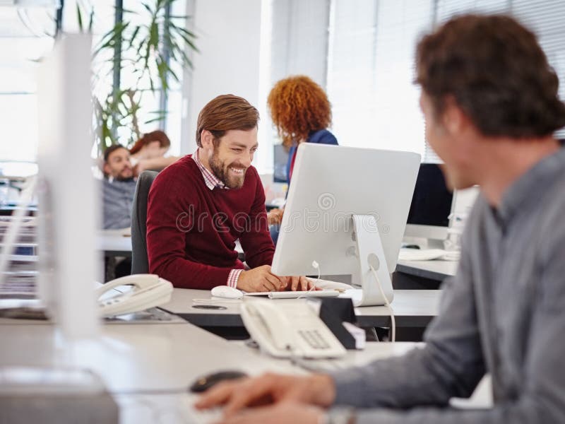 Working Hard or Hardly Working. Business Colleagues Working on ...