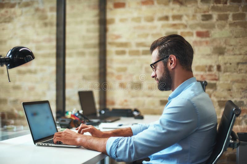 Working Hard. Side View of Young Bearded Man in Eyeglasses and Formal ...