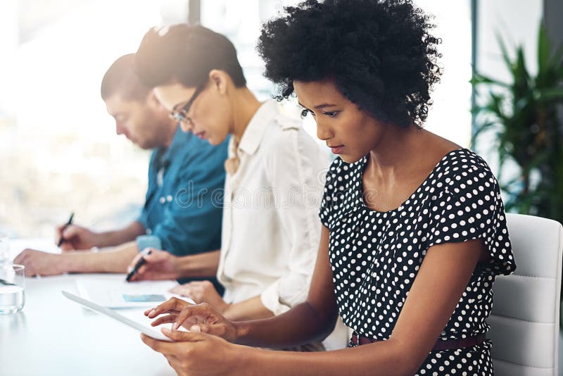 Working Hard and Staying Committed To Meet Their Deadlines. a Group of ...