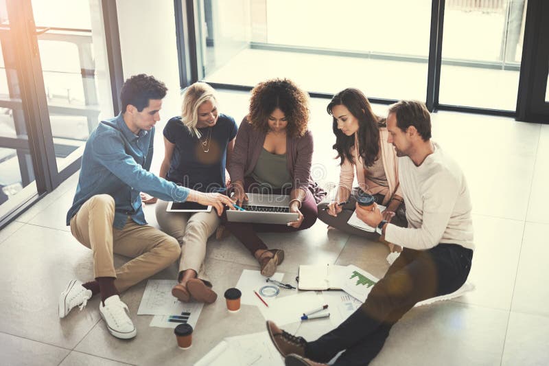 Working Hard To Avoid Any Potential Pitfalls. a Team of Designers ...