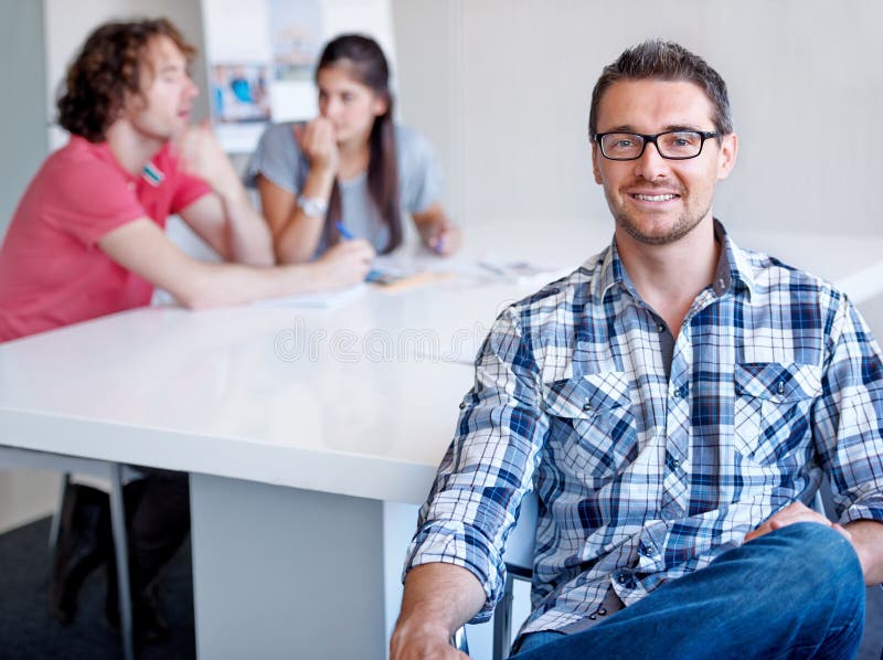 Working Hard To Reach Their Creative Goals Together. a Young Team of ...