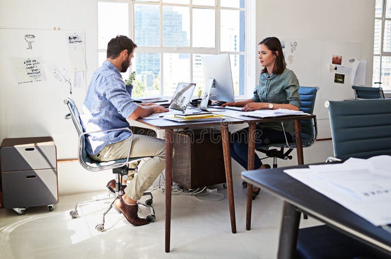 Working Hard To Turn Their Startup into a Success. Colleagues Working ...