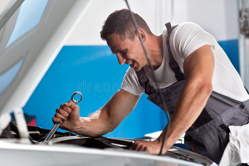 Working hard in a workshop stock photo. Image of occupation - 73439540