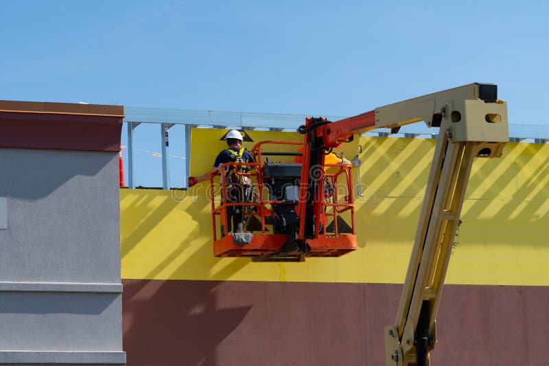 Working at height building editorial photography. Image of build ...