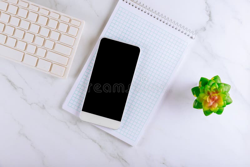 Working on His Computer Keyboard in Spiral Notepad Stock Photo - Image ...