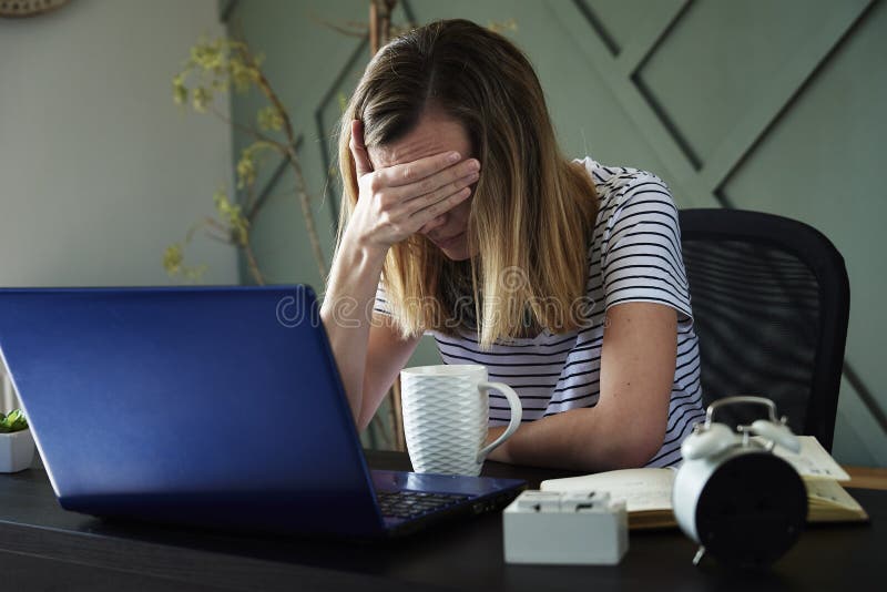 Exhausted Woman at Home Office Workplace Using Laptop Stock Image ...