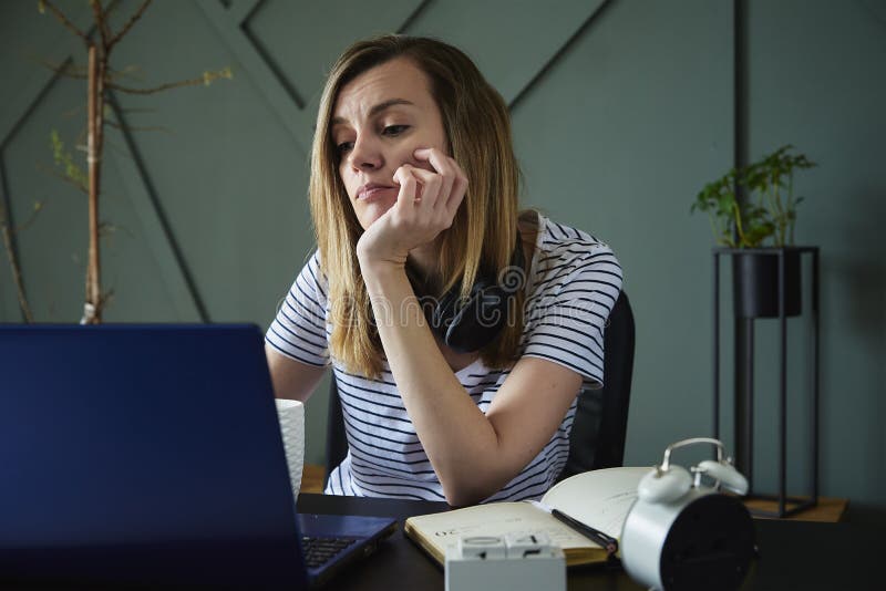 Exhausted Woman at Home Office Workplace Using Laptop Stock Image ...