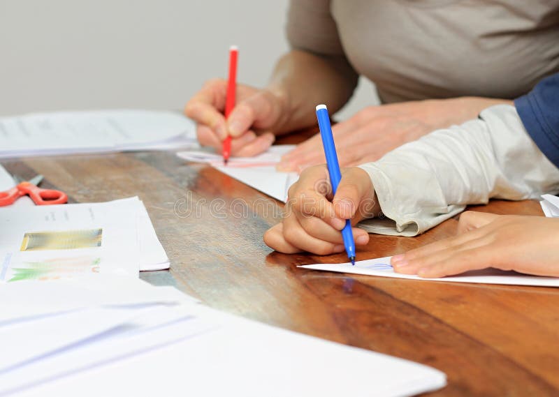 Home Doing Office Work on the Table with Pen and Paper Stock Photo ...