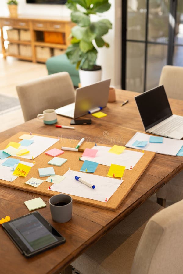 Working from Home, Laptops and Tablets on Table with Sticky Notes and ...