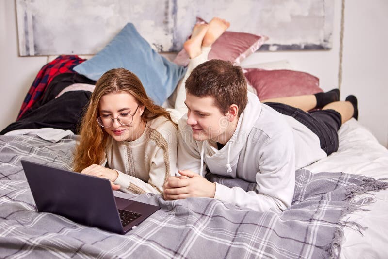 Working Remotely from Home during Coronavirus Lockdown, Young Couple ...