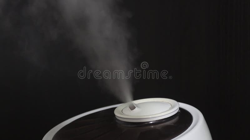 Working Humidifier at Black Background Stock Footage - Video of ...
