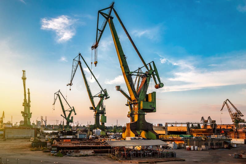Working Industrial Port Cranes at Sunset Stock Image - Image of ...