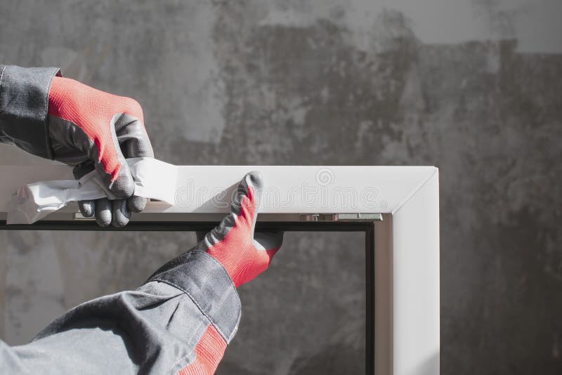 A Working Installer Assembles the Window Frame Stock Image - Image of ...