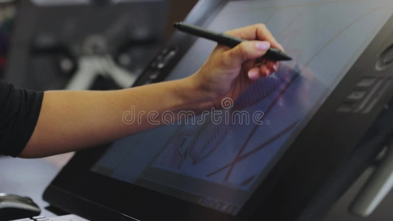 Drawing on a Graphics Tablet. the Designer Draws on a Graphics Tablet ...
