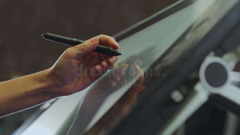 Working with Interactive Pen Display. Drawing on a Graphics Tablet. the ...