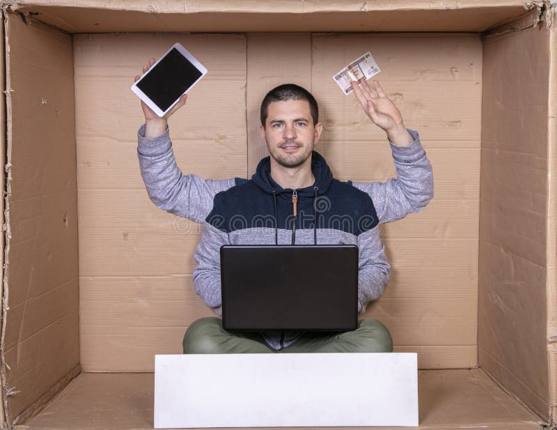 Working on the Internet Brings Income for a Young Man Stock Photo ...
