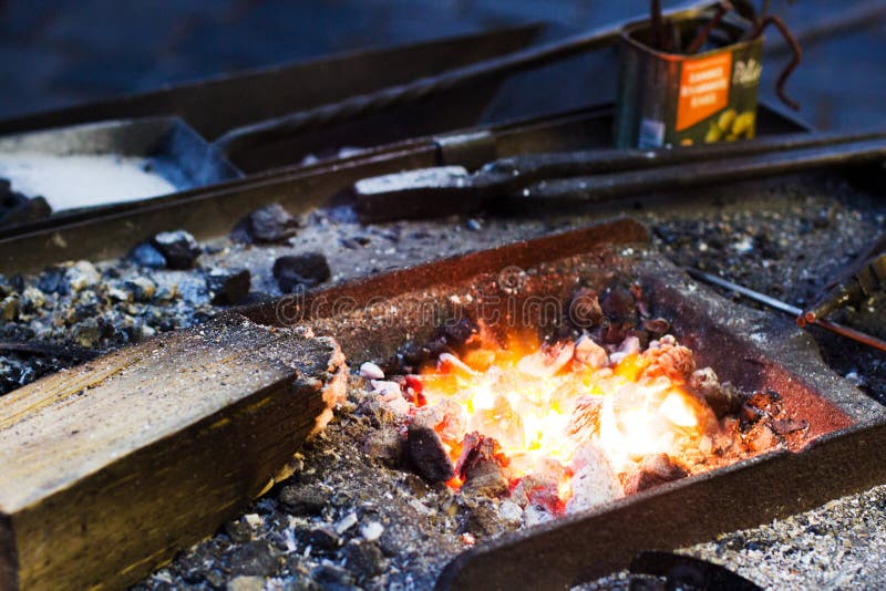 Working iron craftsman stock image. Image of blacksmith - 82095753