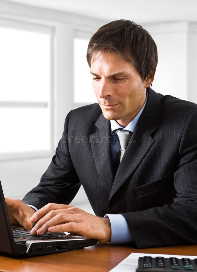 Working on a laptop stock image. Image of connection - 24868125