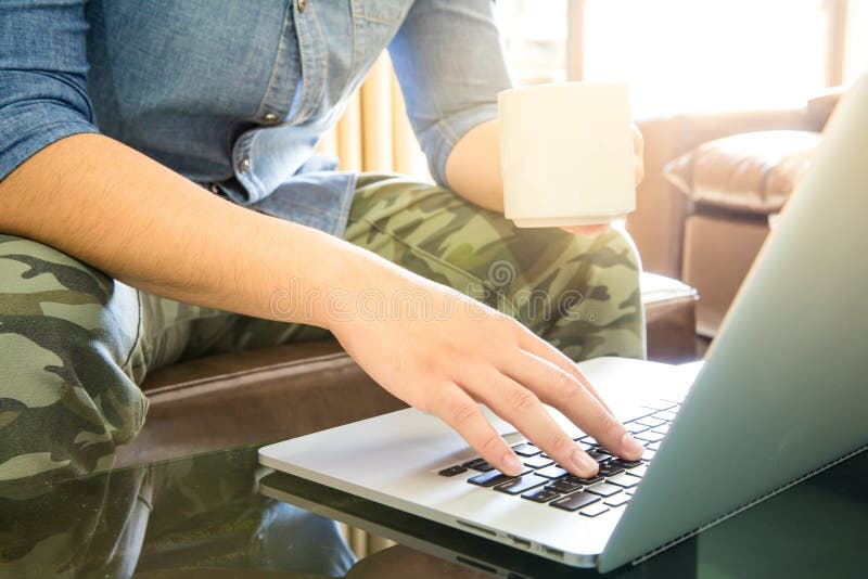 Working in laptop stock image. Image of indoor, coffe - 98153123