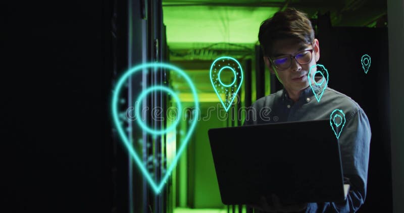 Working on Laptop, Man Surrounded by Location Pin Images in Server Room ...