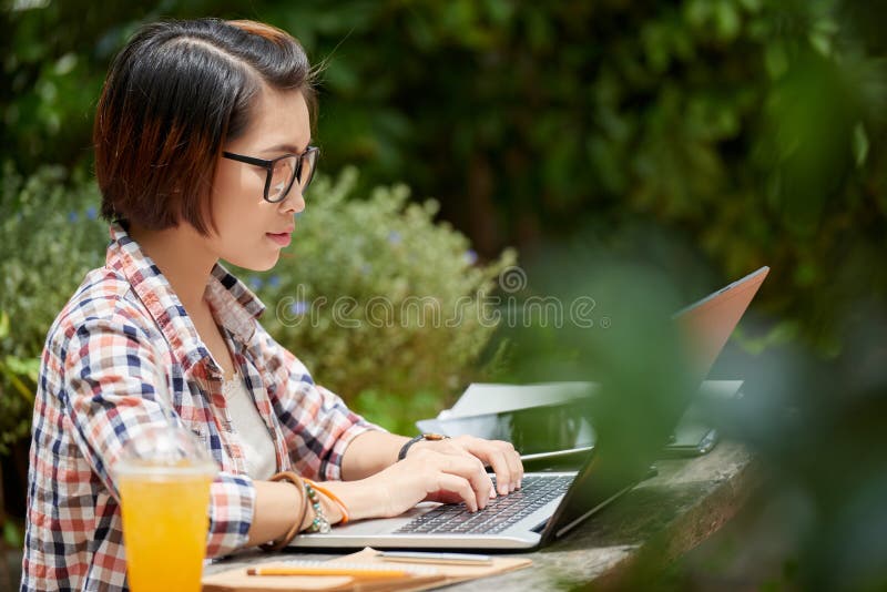 Working on laptop stock photo. Image of girl, sideview - 80728010