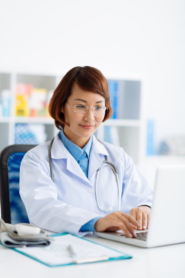 Vietnamese female doctor stock image. Image of confident - 48121963