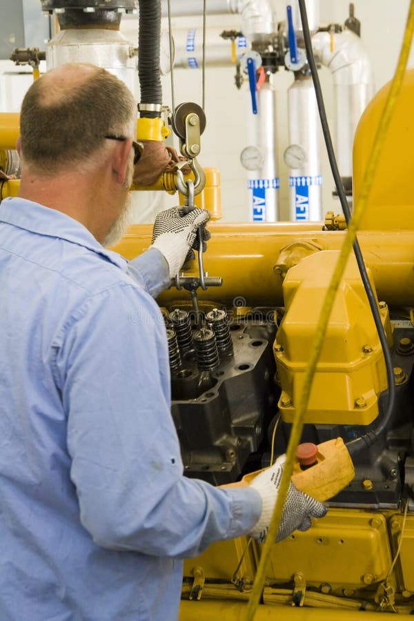 Technician Performing Maintenance Heavy Equipment Stock Photos - Free ...