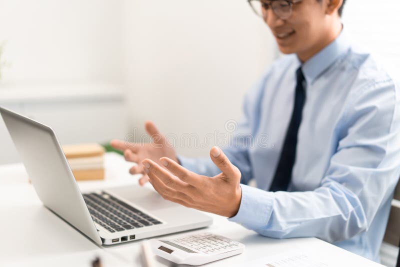 Working Man Conept the Man with Glasses Sitting at His Desk, Smiling ...