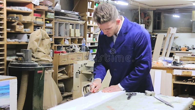 Working Man Examining Edging Strips Stock Video - Video of skills ...