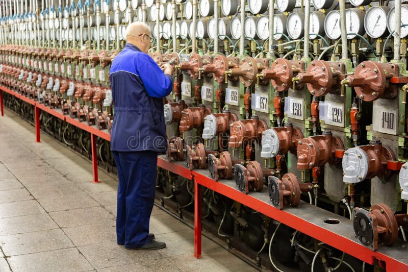 Working Man Near the Measuring Equipment Editorial Stock Image - Image ...