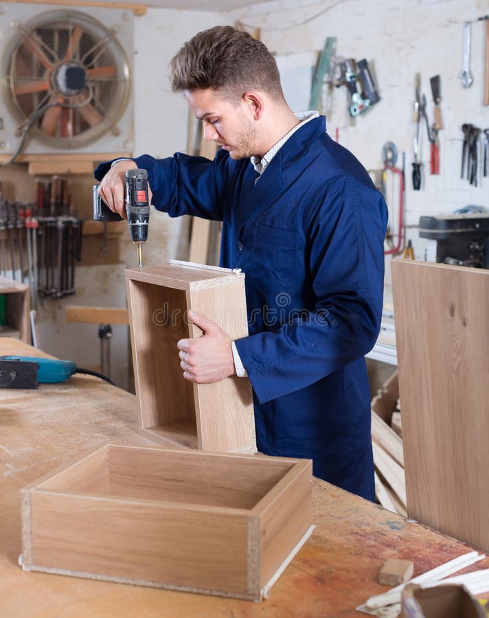 Working Man Practising His Skills in Making Drawer at Workshop Stock ...