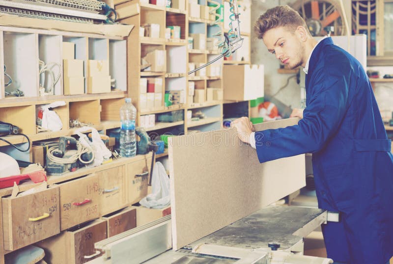Working Man Preparing Chipboard for Work Stock Image - Image of ...