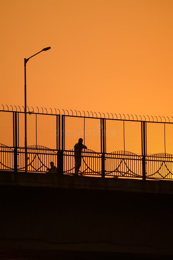 Working Man Standing Alone during Sunset Stock Image - Image of bridge ...