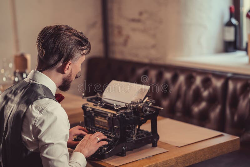 Working Man Typing on a Retro Typewriter Stock Photo - Image of ...