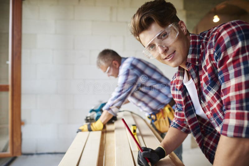 Working men stock image. Image of bending, space, leaning - 79412779
