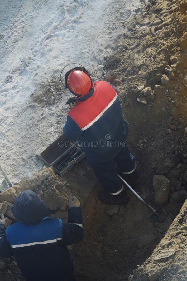 Working Men in the Form of Standing Around a Sand Pit Stock Image ...