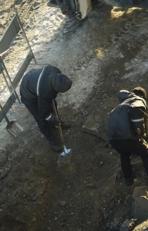 Working Men in the Form of Standing Around a Sand Pit Editorial Photo ...