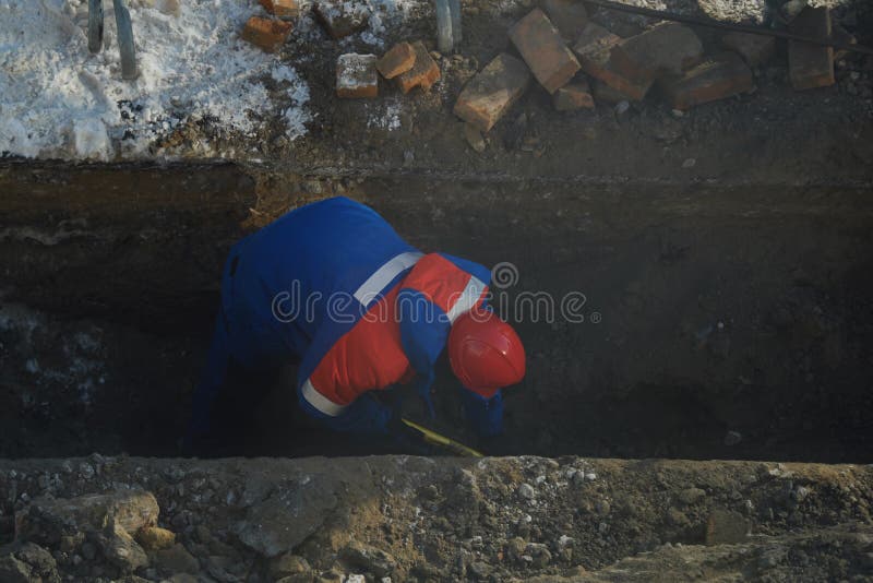 Working Men in the Form of Standing Around a Sand Pit Stock Photo ...