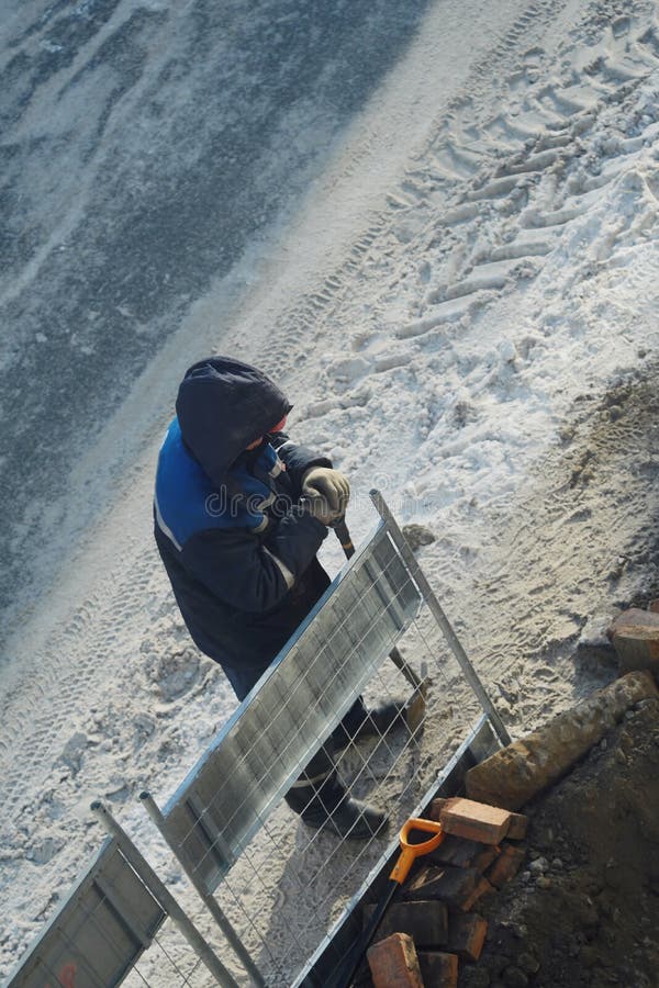 Working Men in the Form of Standing Around a Sand Pit Stock Photo ...